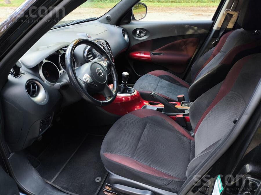 Black Nissan Juke 2011 in Riga, with an engine capacity of 1.50 L and mileage of 123 thousand km for 4950 €, photo 14 on AUTOMOTO.COM.LV