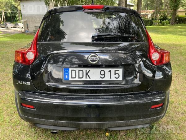 Black Nissan Juke 2012 in Riga, with an engine capacity of 1.60 L and mileage of 105 thousand km for 5880 €, photo 8 on AUTOMOTO.COM.LV
