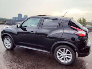 Black Nissan Juke 2015 in Vilnius, with an engine capacity of 1.62 L and mileage of 95 thousand km for 6950 €, photo  on AUTOMOTO.COM.LV