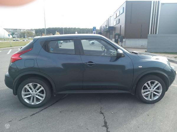 Blue Nissan Juke 2014 in Vilnius, with an engine capacity of 1.60 L and mileage of 143 thousand km for 7399 €, photo 4 on AUTOMOTO.COM.LV