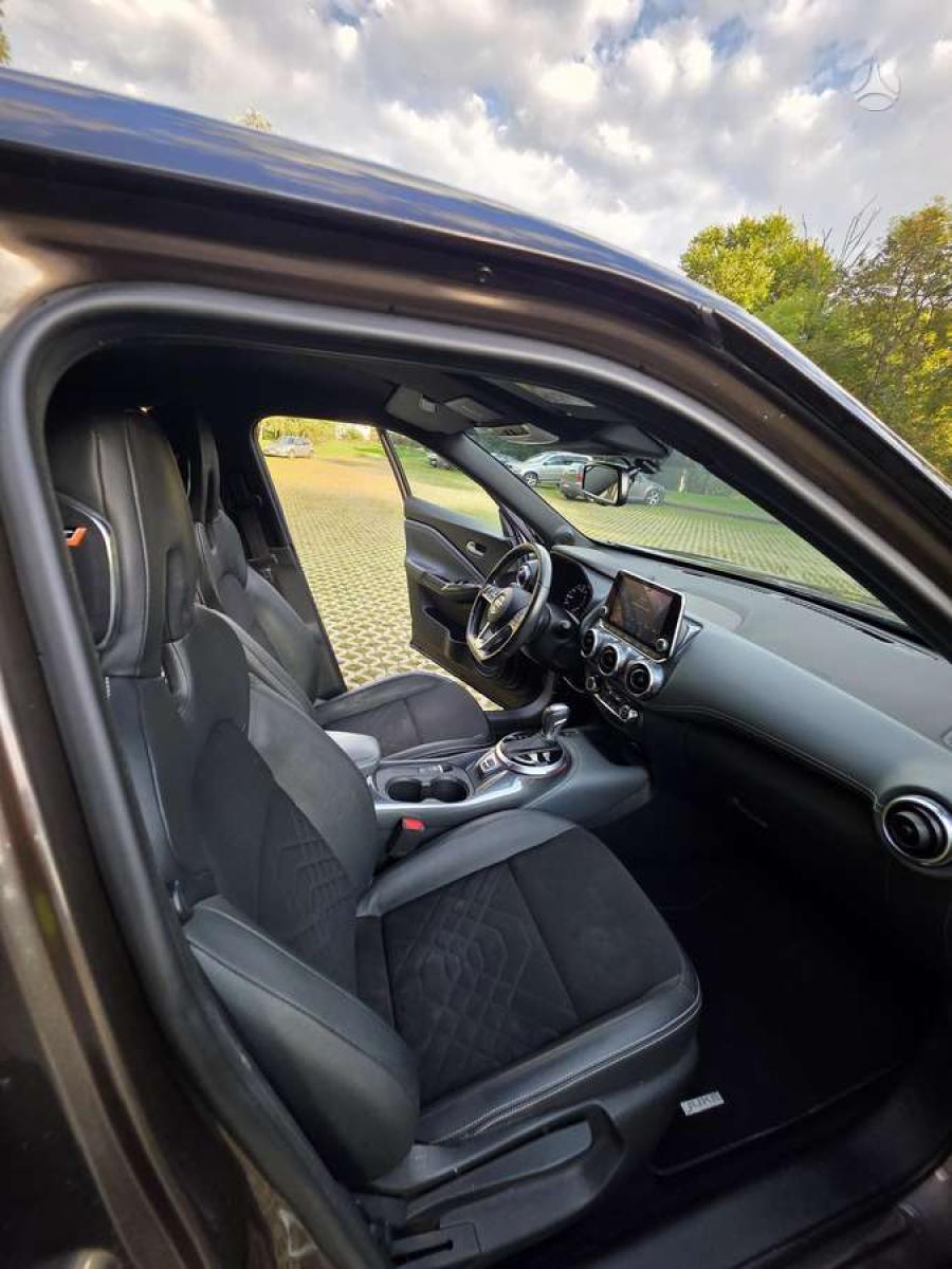Brown Nissan Juke 2020 in Vilnius, with an engine capacity of 1.00 L and mileage of 84 thousand km for 14800 €, photo 13 on AUTOMOTO.COM.LV