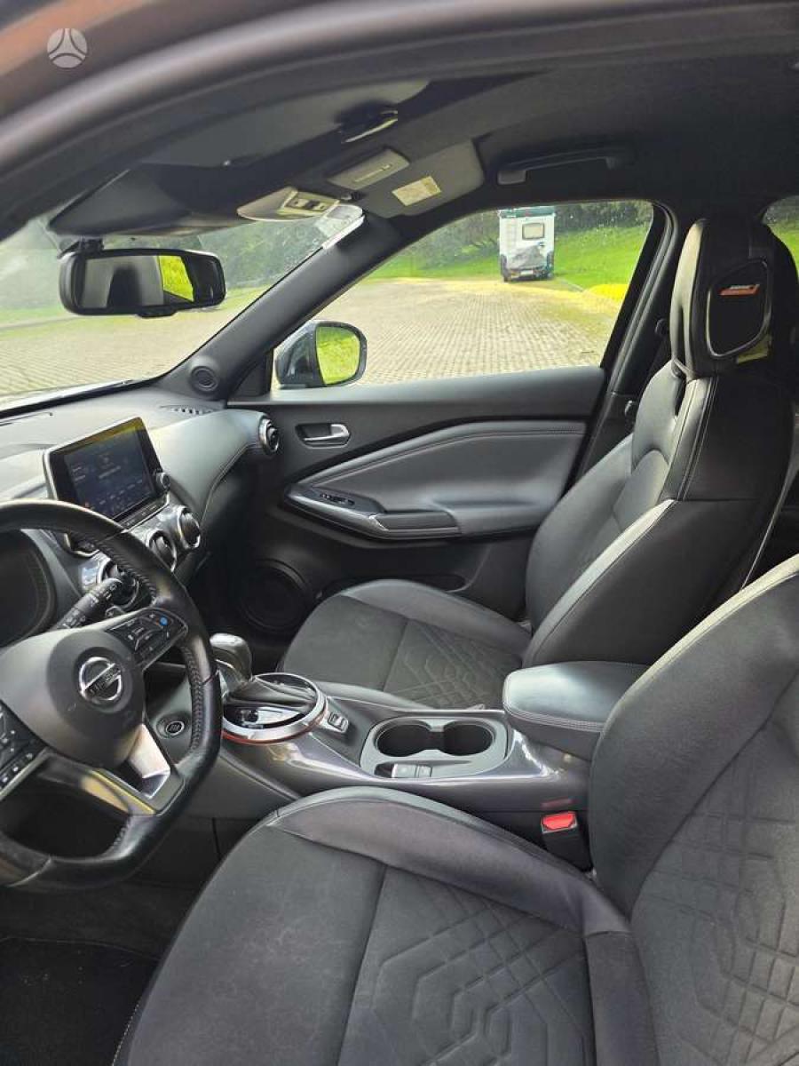 Brown Nissan Juke 2020 in Vilnius, with an engine capacity of 1.00 L and mileage of 84 thousand km for 14800 €, photo 17 on AUTOMOTO.COM.LV