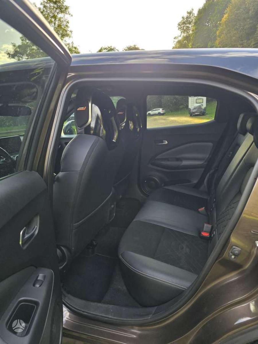 Brown Nissan Juke 2020 in Vilnius, with an engine capacity of 1.00 L and mileage of 84 thousand km for 14800 €, photo 18 on AUTOMOTO.COM.LV