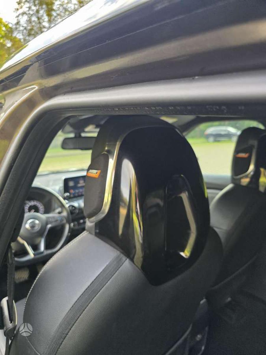 Brown Nissan Juke 2020 in Vilnius, with an engine capacity of 1.00 L and mileage of 84 thousand km for 14800 €, photo 19 on AUTOMOTO.COM.LV