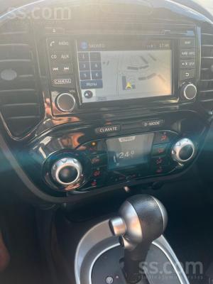 Brown Nissan Juke 2020 in Riga, with an engine capacity of 1.60 L and mileage of 100 thousand km for 8250 €, photo 10 on AUTOMOTO.COM.LV