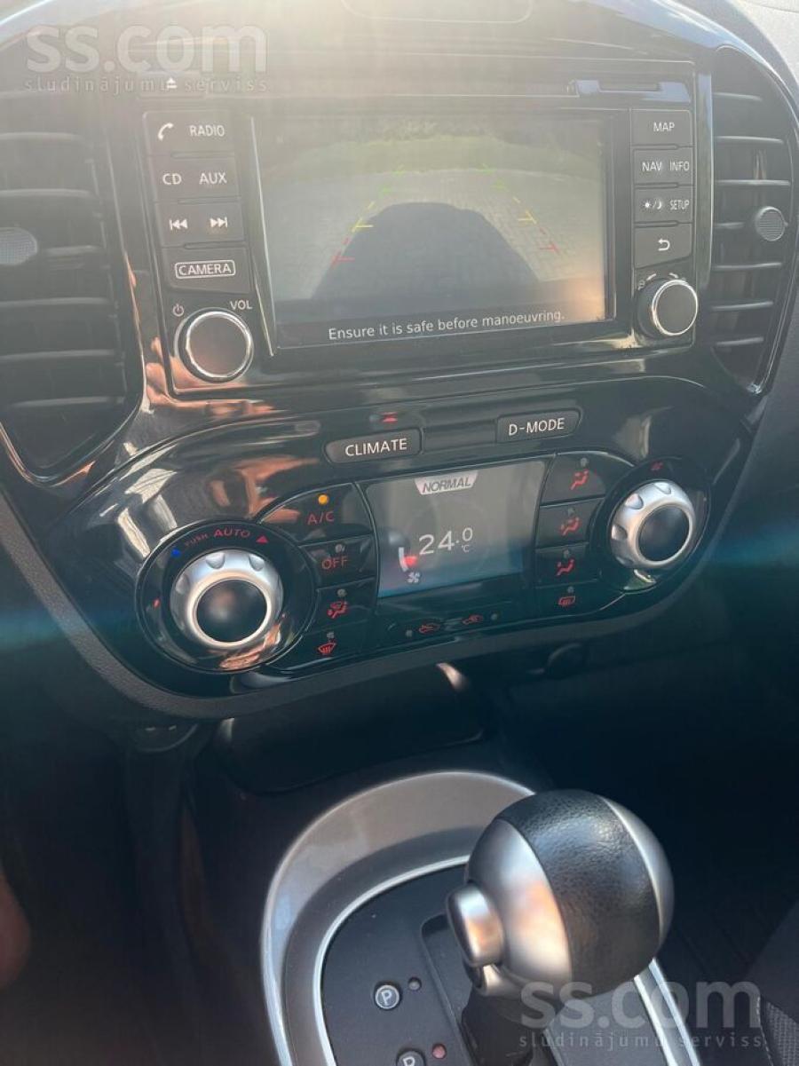 Brown Nissan Juke 2020 in Riga, with an engine capacity of 1.60 L and mileage of 100 thousand km for 8250 €, photo 11 on AUTOMOTO.COM.LV