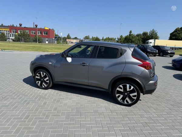 Grey Nissan Juke 2014 in Telschi, with an engine capacity of 1.46 L and mileage of 235 thousand km for 4599 €, photo 3 on AUTOMOTO.COM.LV