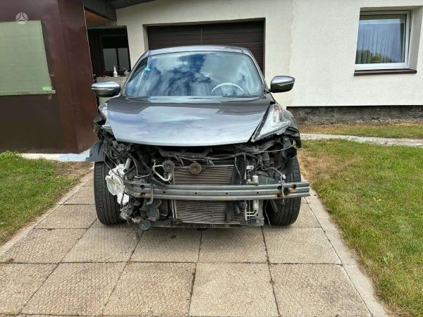 Grey Nissan Juke 2015 in Silute, with an engine capacity of 1.20 L and mileage of 242 thousand km for 3500 €, photo 3 on AUTOMOTO.COM.LV
