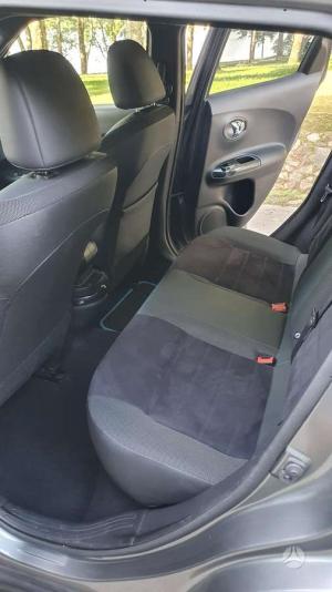 Grey Nissan Juke 2018 in Plunge, with an engine capacity of 1.46 L and mileage of 156 thousand km for 7400 €, photo 13 on AUTOMOTO.COM.LV