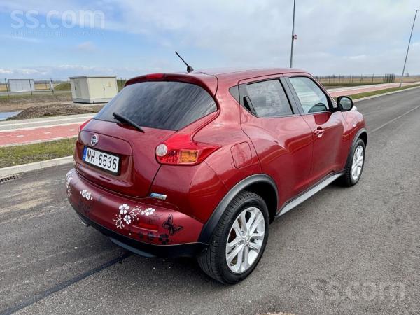 Red Nissan Juke 2011 in Liepaja, with an engine capacity of 1.50 L and mileage of 291 thousand km for 5400 €, photo 6 on AUTOMOTO.COM.LV