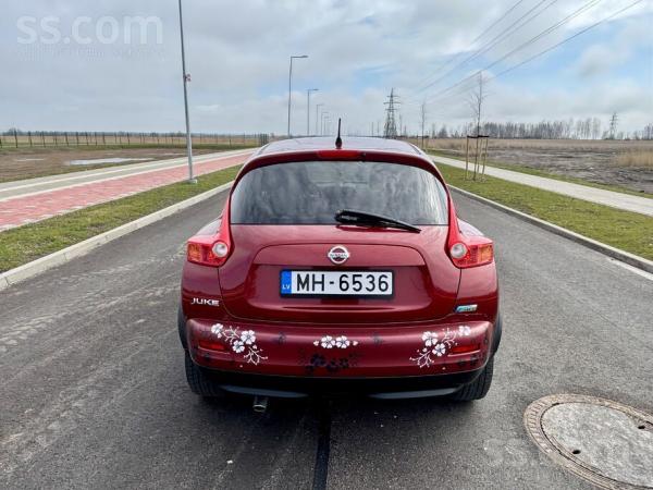 Red Nissan Juke 2011 in Liepaja, with an engine capacity of 1.50 L and mileage of 291 thousand km for 5400 €, photo 8 on AUTOMOTO.COM.LV