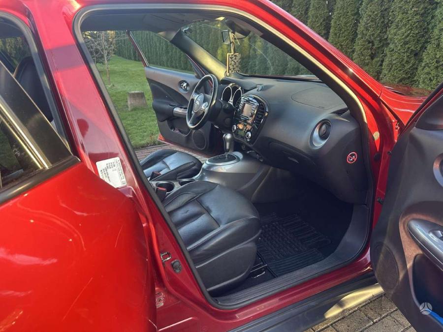 Red Nissan Juke 2013 in Birzai, with an engine capacity of 1.60 L and mileage of 131 thousand km for 5300 €, photo 15 on AUTOMOTO.COM.LV
