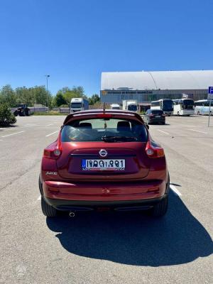 Red Nissan Juke 2013 in Siauliai, with an engine capacity of 1.60 L and mileage of 99 thousand km for 5800 €, photo 3 on AUTOMOTO.COM.LV
