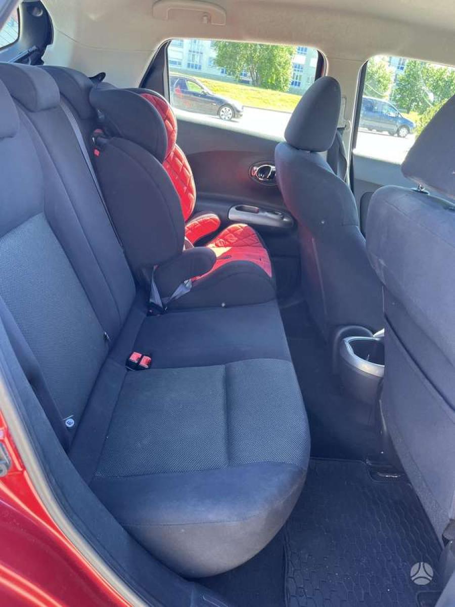 Red Nissan Juke 2013 in Siauliai, with an engine capacity of 1.60 L and mileage of 99 thousand km for 5800 €, photo 7 on AUTOMOTO.COM.LV