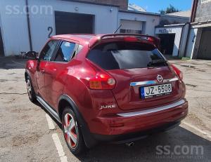 Red Nissan Juke 2013 in Riga, with an engine capacity of 1.60 L and mileage of 143 thousand km for 6300 €, photo 5 on AUTOMOTO.COM.LV