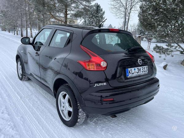Red Nissan Juke 2014 in Panevezys, with an engine capacity of 1.46 L and mileage of 162 thousand km for 3950 €, photo 5 on AUTOMOTO.COM.LV