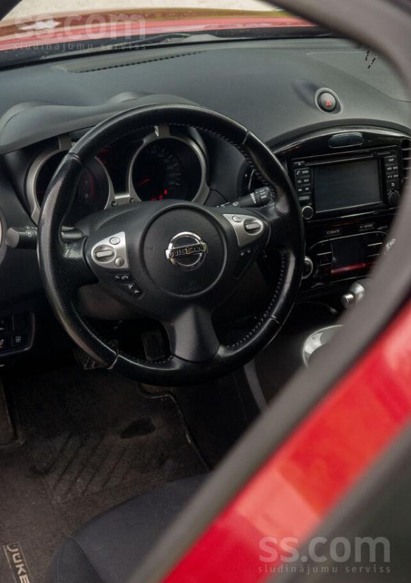 Red Nissan Juke 2014 in Riga, with an engine capacity of 1.60 L and mileage of 187 thousand km for 6700 €, photo 7 on AUTOMOTO.COM.LV