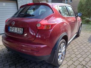 Red Nissan Juke 2014 in Kaunas, with an engine capacity of 1.60 L and mileage of 136 thousand km for 4950 €, photo 6 on AUTOMOTO.COM.LV