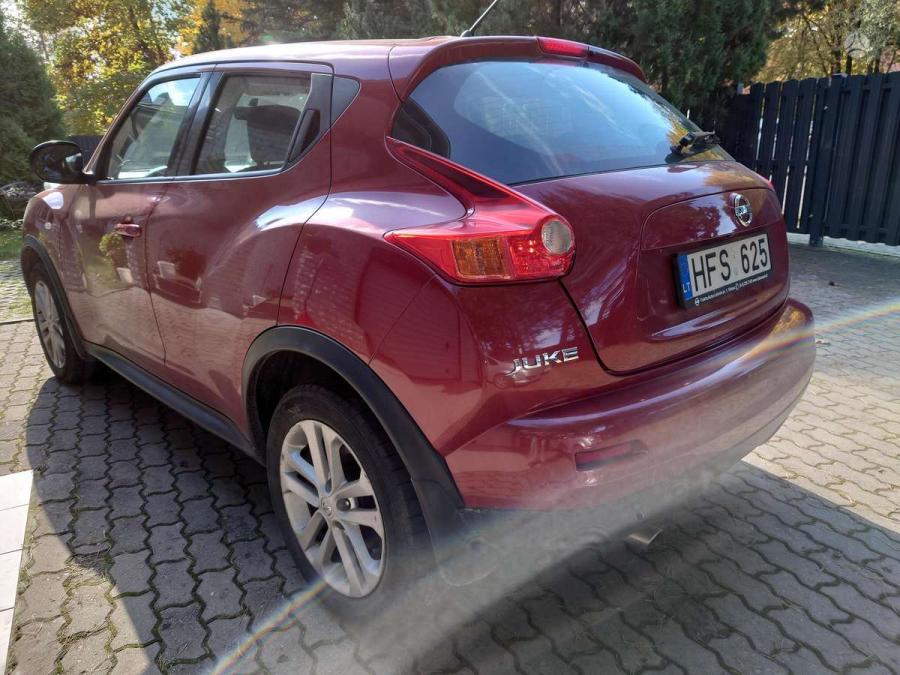 Red Nissan Juke 2014 in Kaunas, with an engine capacity of 1.60 L and mileage of 136 thousand km for 4950 €, photo 7 on AUTOMOTO.COM.LV
