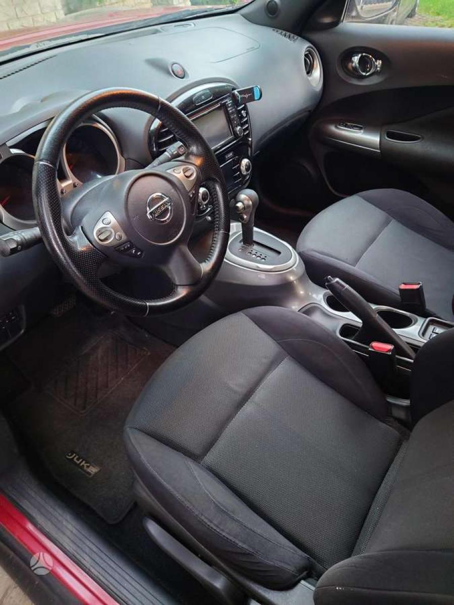 Red Nissan Juke 2014 in Kaunas, with an engine capacity of 1.60 L and mileage of 136 thousand km for 4950 €, photo 9 on AUTOMOTO.COM.LV