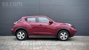 Red Nissan Juke 2016 in Riga, with an engine capacity of 1.60 L and mileage of 143 thousand km for 6950 €, photo 6 on AUTOMOTO.COM.LV