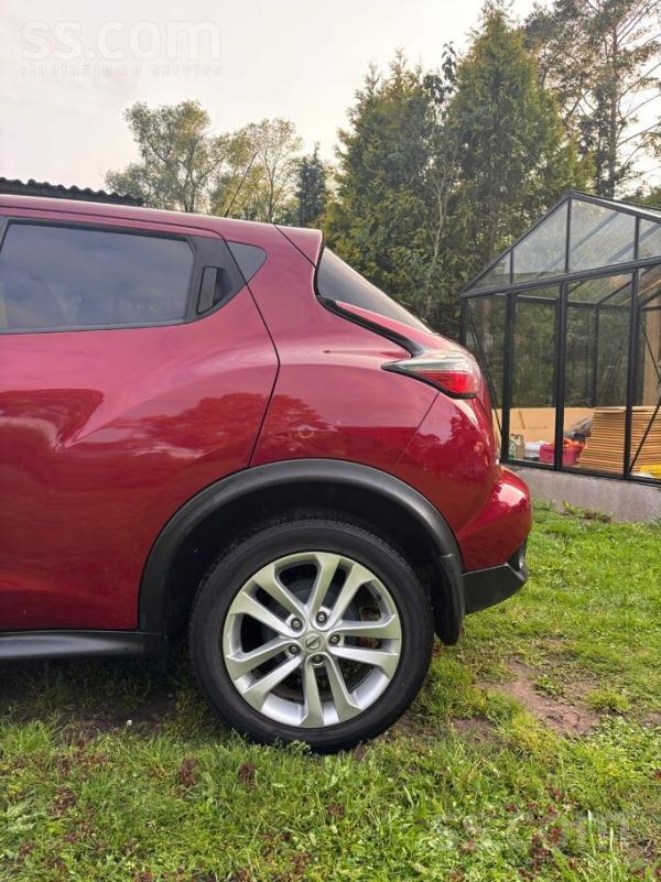 Red Nissan Juke 2017 in Riga, with an engine capacity of 1.60 L and mileage of 103 thousand km for 7100 €, photo 6 on AUTOMOTO.COM.LV