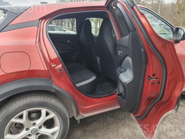 Red Nissan Juke 2021 in Liepaja, with an engine capacity of 1.00 L and mileage of 32 thousand km for 13900 €, photo 4 on AUTOMOTO.COM.LV