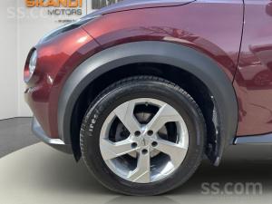 Red Nissan Juke 2021 in Riga, with an engine capacity of 1.00 L and mileage of 58 thousand km for 12490 €, photo 19 on AUTOMOTO.COM.LV