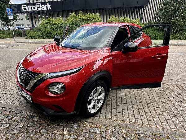 Red Nissan Juke 2022 in Riga, with an engine capacity of 1.00 L and mileage of 72 thousand km for 14250 €, photo 8 on AUTOMOTO.COM.LV