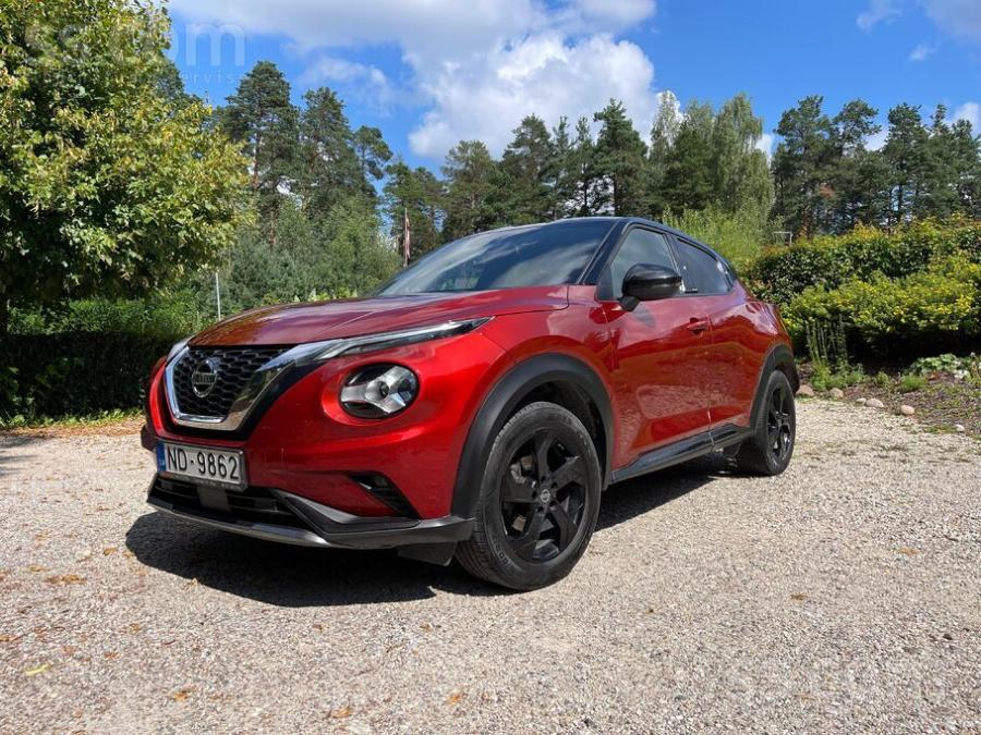 Red Nissan Juke 2022 in Riga, with an engine capacity of 1.00 L and mileage of 100 thousand km for 12800 €, photo 1 on AUTOMOTO.COM.LV