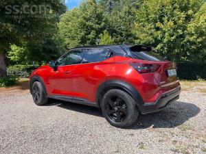 Red Nissan Juke 2022 in Riga, with an engine capacity of 1.00 L and mileage of 100 thousand km for 12800 €, photo 5 on AUTOMOTO.COM.LV