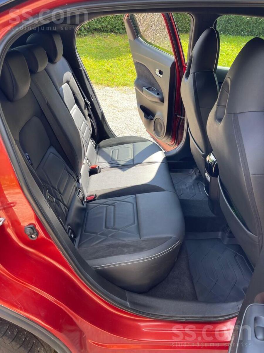 Red Nissan Juke 2022 in Riga, with an engine capacity of 1.00 L and mileage of 100 thousand km for 12800 €, photo 6 on AUTOMOTO.COM.LV