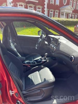 Red Nissan Juke 2022 in Riga, with an engine capacity of 1.00 L and mileage of 100 thousand km for 12800 €, photo 9 on AUTOMOTO.COM.LV