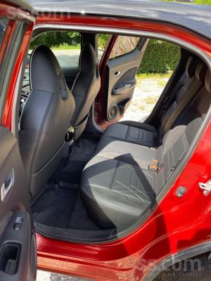 Red Nissan Juke 2022 in Riga, with an engine capacity of 1.00 L and mileage of 100 thousand km for 12800 €, photo 12 on AUTOMOTO.COM.LV