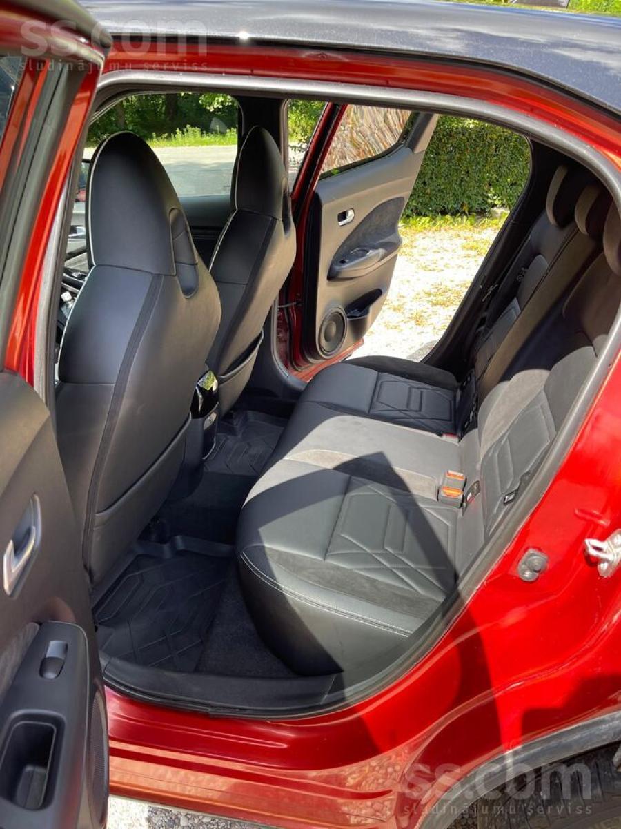 Red Nissan Juke 2022 in Riga, with an engine capacity of 1.00 L and mileage of 100 thousand km for 12800 €, photo 12 on AUTOMOTO.COM.LV