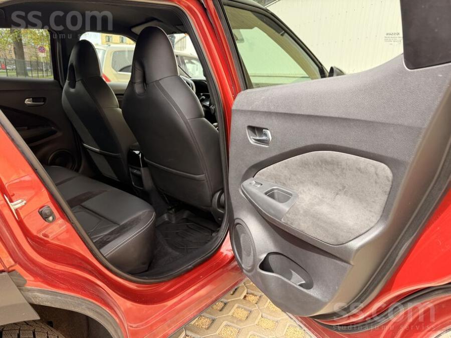 Red Nissan Juke 2022 in Riga, with an engine capacity of 1.00 L and mileage of 100 thousand km for 12800 €, photo 13 on AUTOMOTO.COM.LV