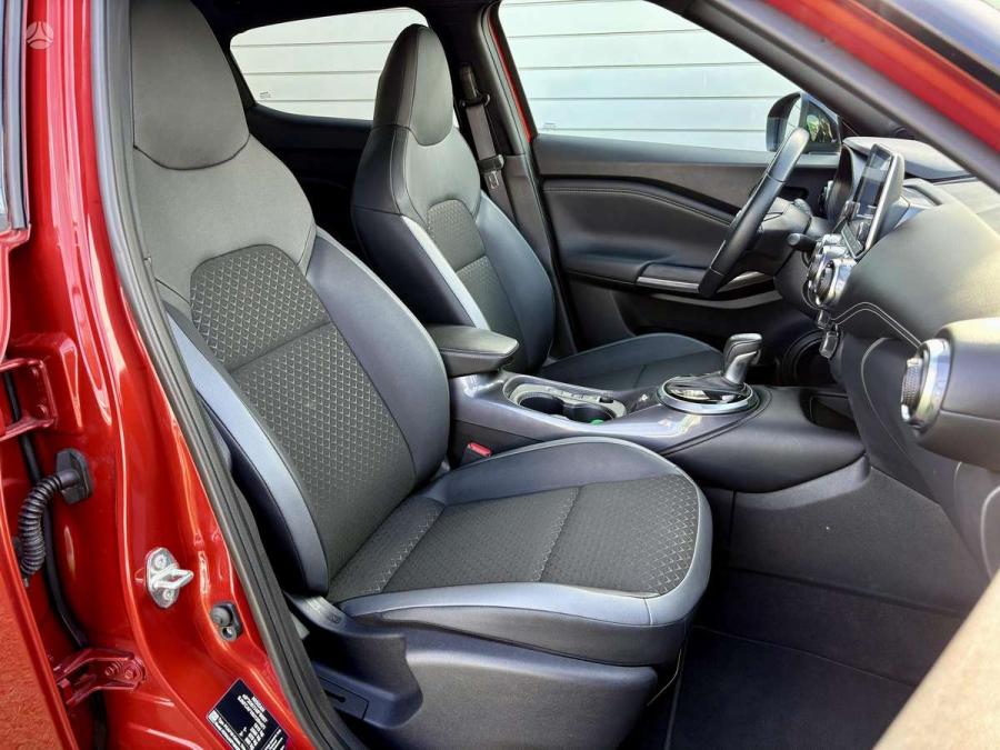 Red Nissan Juke 2023 in Panevezys, with an engine capacity of 1.60 L and mileage of 22 thousand km for 16700 €, photo 21 on AUTOMOTO.COM.LV