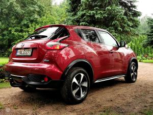 Red Nissan Juke 2014 in Siauliai, with an engine capacity of 1.50 L and mileage of 165 thousand km for 5499 €, photo 3 on AUTOMOTO.COM.LV