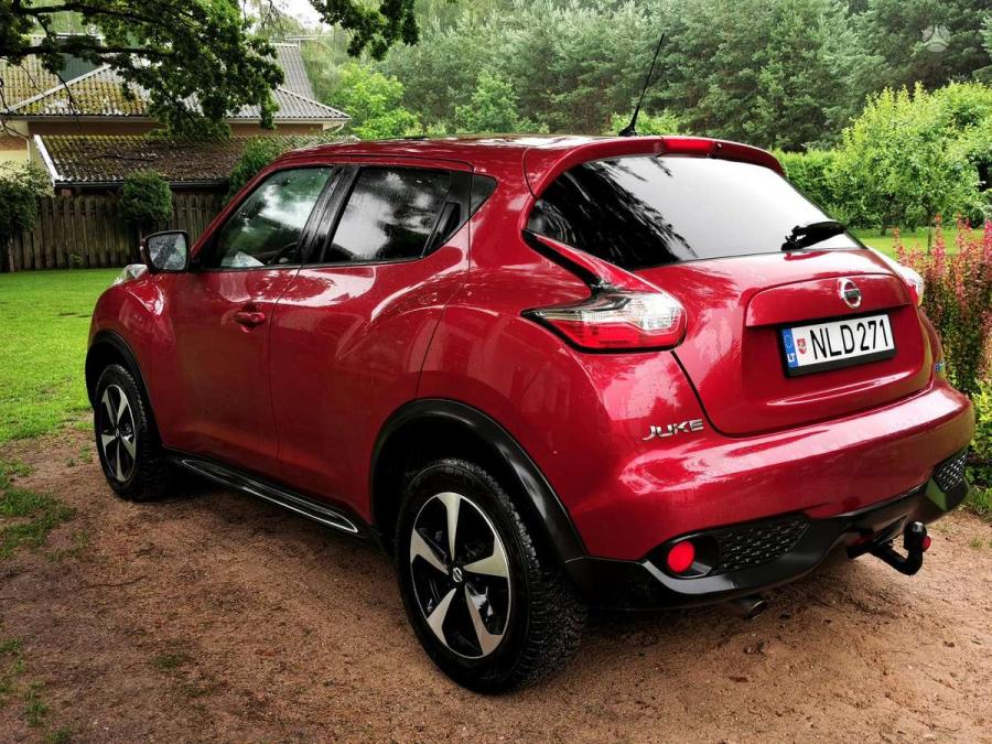 Red Nissan Juke 2014 in Siauliai, with an engine capacity of 1.50 L and mileage of 165 thousand km for 5499 €, photo 4 on AUTOMOTO.COM.LV