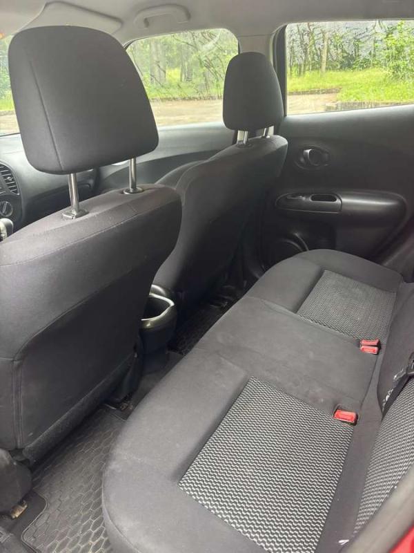 Red Nissan Juke 2015 in Vilnius, with an engine capacity of 1.60 L and mileage of 138 thousand km for 6250 €, photo 8 on AUTOMOTO.COM.LV