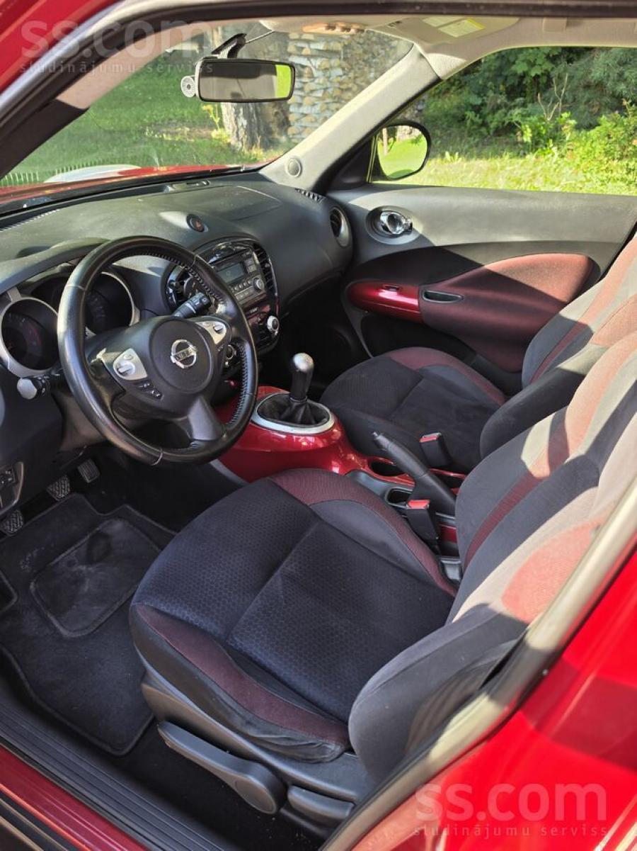Red Nissan Juke 2012 in Riga, with an engine capacity of 1.60 L and mileage of 233 thousand km for 4500 €, photo 5 on AUTOMOTO.COM.LV