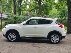 White Nissan Juke 2011 in Riga, with an engine capacity of 1.60 L and mileage of 237 thousand km for 4500 €, photo 6 on AUTOMOTO.COM.LV