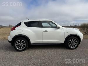 White Nissan Juke 2013 in Ogre, with an engine capacity of 1.60 L and mileage of 96 thousand km for 6800 €, photo 5 on AUTOMOTO.COM.LV