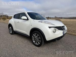 White Nissan Juke 2013 in Ogre, with an engine capacity of 1.60 L and mileage of 96 thousand km for 6800 €, photo 8 on AUTOMOTO.COM.LV