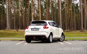 White Nissan Juke 2014 in Riga, with an engine capacity of 1.60 L and mileage of 118 thousand km for 8590 €, photo 5 on AUTOMOTO.COM.LV