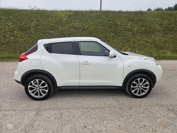 White Nissan Juke 2014 in Vilnius, with an engine capacity of 1.46 L and mileage of 260 thousand km for 4700 €, photo 5 on AUTOMOTO.COM.LV