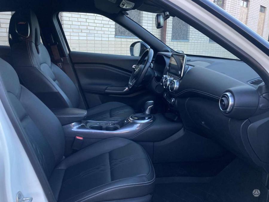Balts Nissan Juke 2023 Marijampole, ar dzinēja tilpumu 1.60 L un nobraukumu 51 tūkst. km par 17350 €, foto 24 vietnē AUTOMOTO.COM.LV