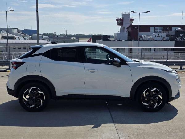 White Nissan Juke 2024 in Vilnius, with an engine capacity of 1.60 L and mileage of 28 thousand km for 21250 €, photo 6 on AUTOMOTO.COM.LV