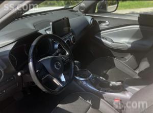 White Nissan Juke 2022 in Riga, with an engine capacity of 1.00 L and mileage of 98 thousand km for 13700 €, photo 5 on AUTOMOTO.COM.LV