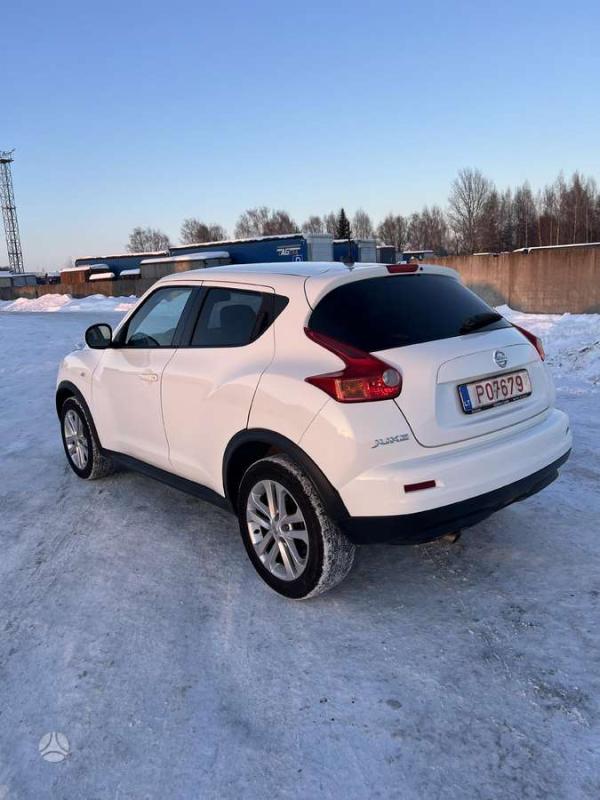 White Nissan Juke 2014 in Panevezys, with an engine capacity of 1.60 L and mileage of 94 thousand km for 5100 €, photo 7 on AUTOMOTO.COM.LV